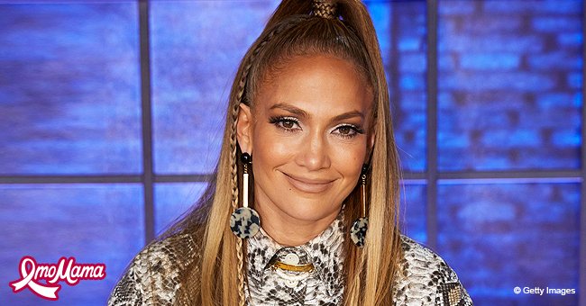 J-Lo Shows off Toned Body in a White Outfit to Promote Her Billboard ...