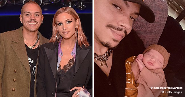 Evan Ross Holds Newborn Son Wrapped in an Orange Blanket Showing His ...