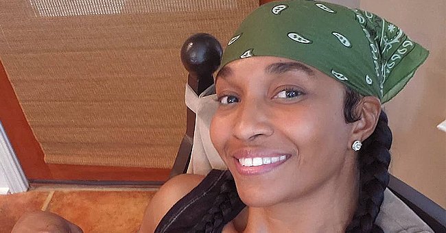 See TLC Singer Chilli's Youthful Look as She Flaunts Long Curly Hair ...