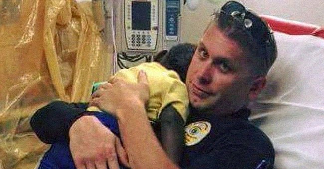 Emotional Story behind Viral Photo of Police Officer Comforting Little ...