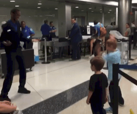 TSA officer faces off with little boy in a dance showdown at airport in ...