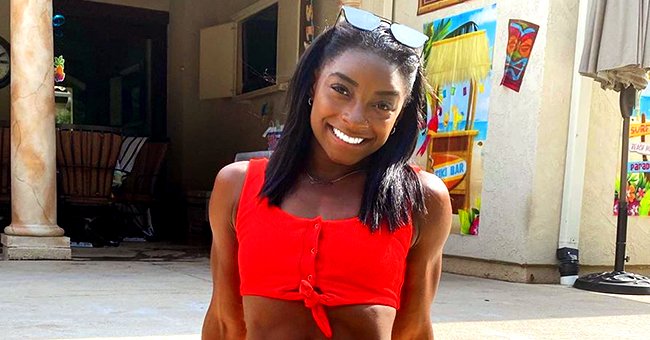 Gymnast Simone Biles Shows off Her Long Hair in a Snap as She Poses in ...
