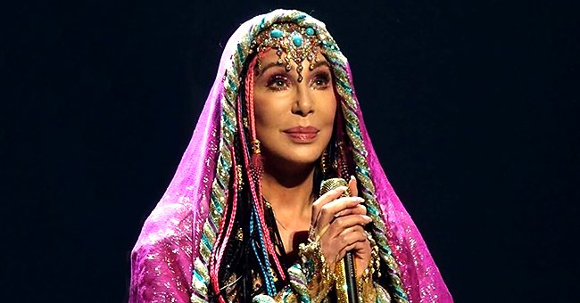 Cher Looks Unforgettable Posing in a Pink Opera Cloak & Headband ...