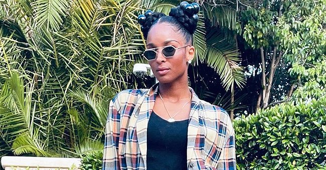 Ciara Grabs Attention Wearing Two Hair Buns in a Long Checkered Shirt ...