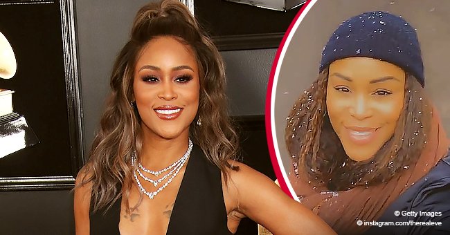 Eve Displays a Beaming Smile as She Walks outside in a Chic Navy Blue ...