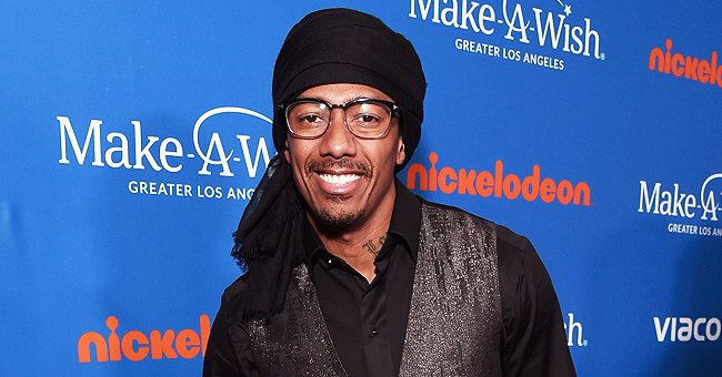 Nick Cannon Shares a Photo Posing with His Three Kids on a Playground ...