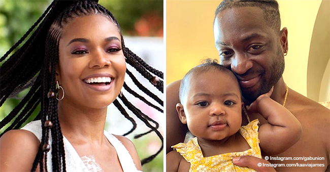 Dwyane Wade Is All Smiles with Baby Kaavia before Stare down during ...