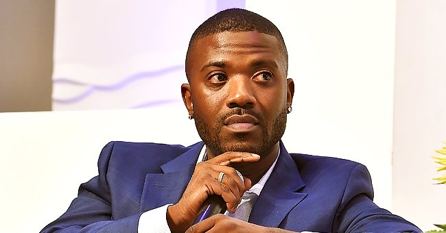 Ray J's Son Epik Looks Serious Sitting on His Mom's Arm While Doing ...
