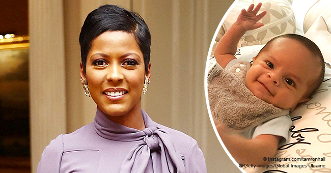 See Tamron Hall's Baby Moses Give a 'Hi Five' in Father's Day Photo