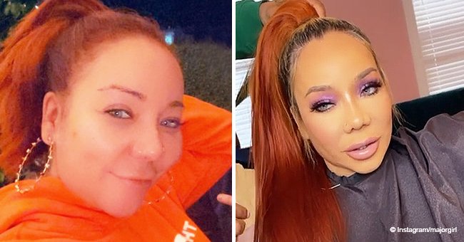 Tiny Harris Poses with Long Red Ponytail and Purple Eye Makeup — It's ...
