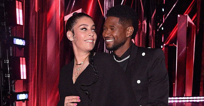 See Usher’s Girlfriend Showing Her Blossoming Baby Bump in Denim ...